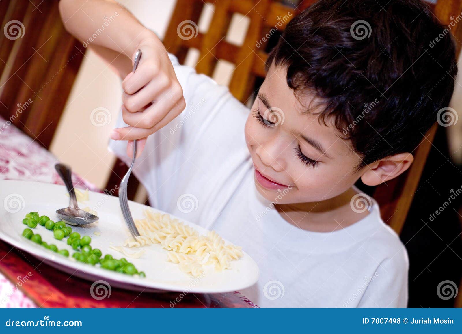 Boy Enjoying Plate of Pasta Stock Photo - Image of green, dinner: 7007498