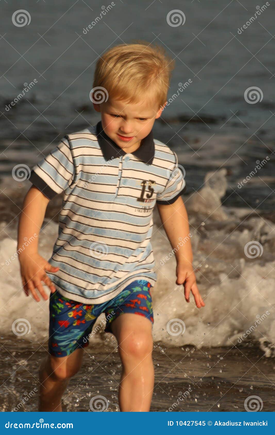 Boy is Escaping from the Sea Stock Image - Image of blond, smile: 10427545