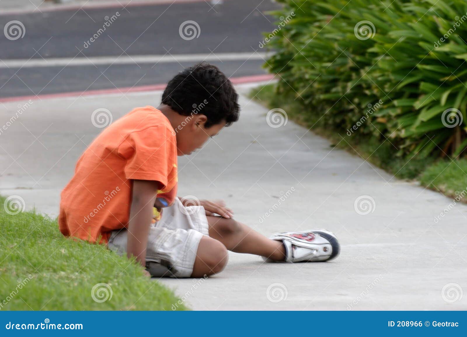 Boy examing his scab stock photo. Image of emergency, youth - 208966