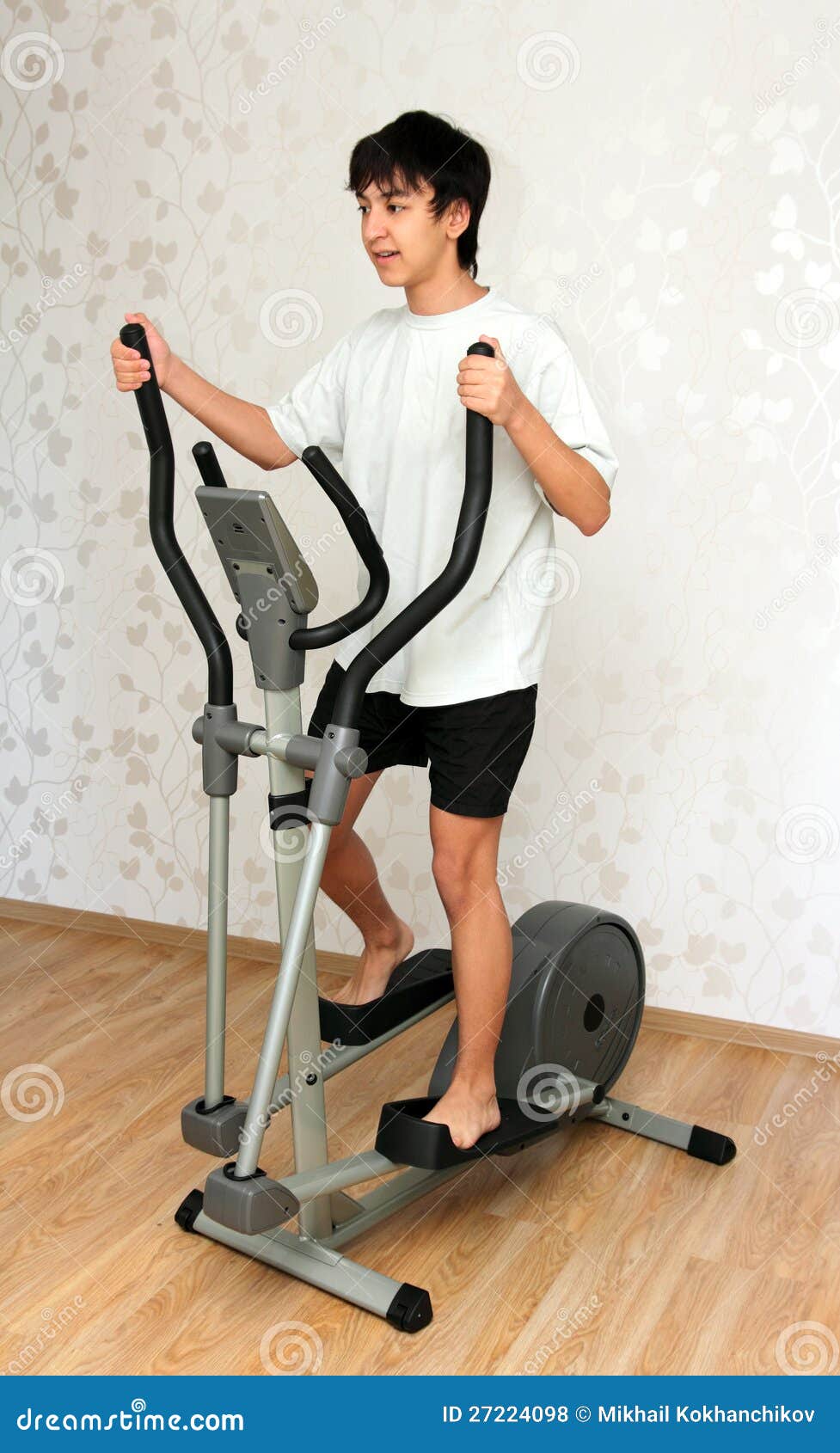 Boy exercising on trainer stock photo. Image of effort - 27224098