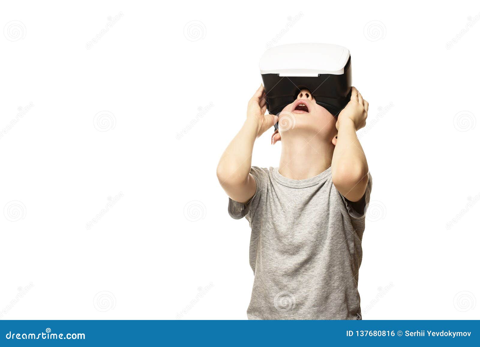 Boy Experiencing Virtual Reality Raising His Head. Isolate on White ...