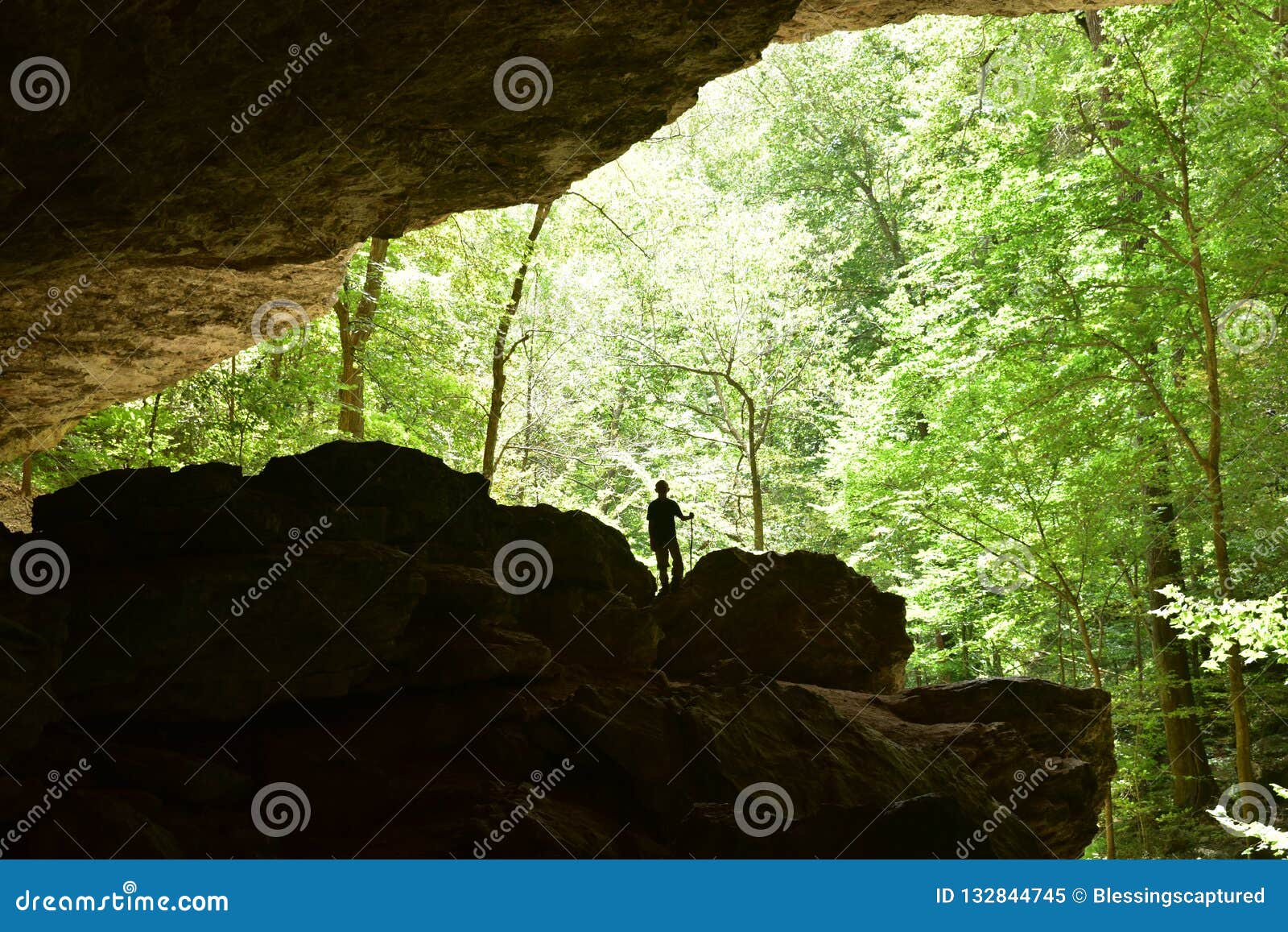 A boy exploring a cave editorial image. Image of bluff - 132844745