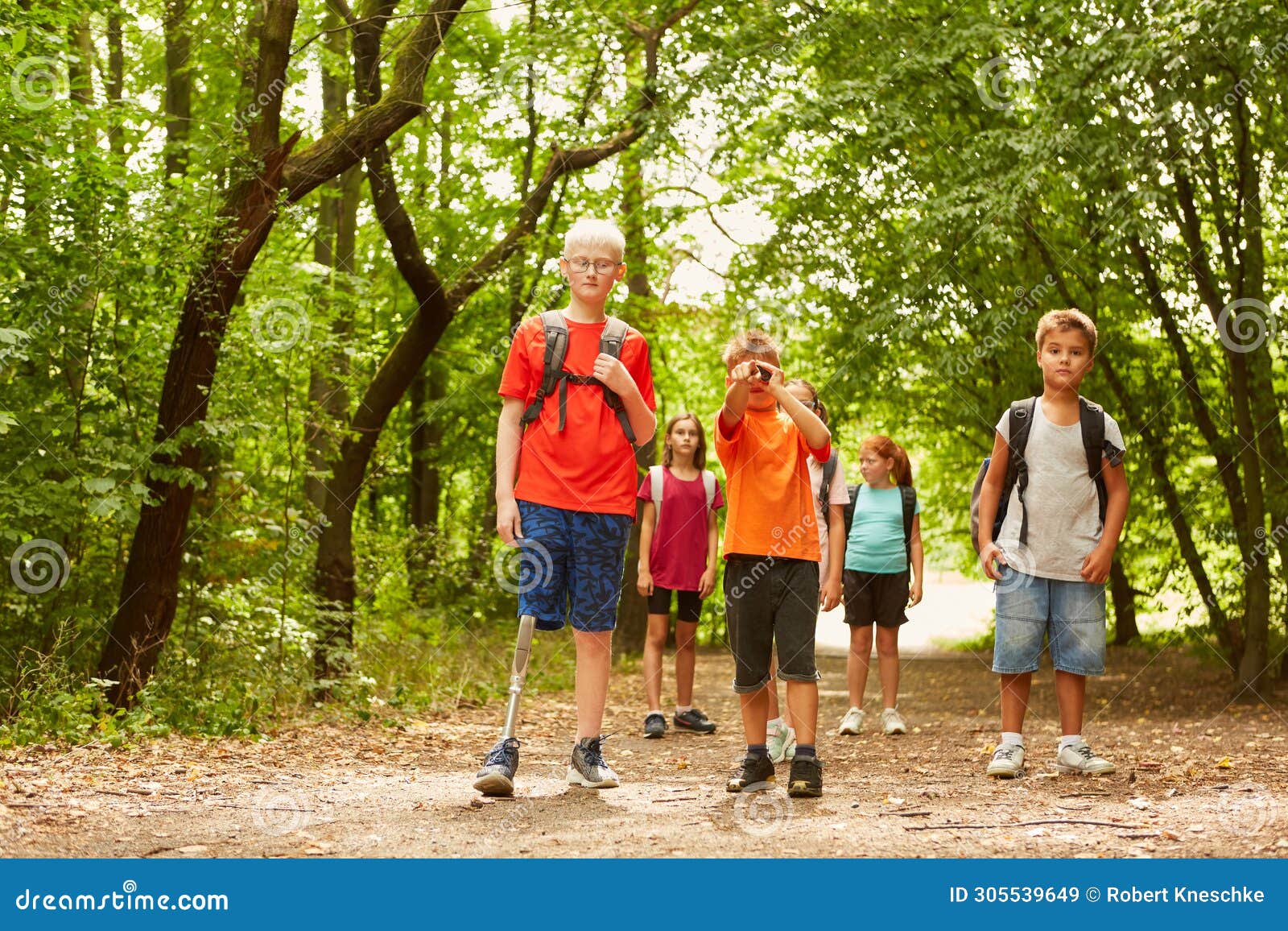 Boy Exploring Forest with Friends Stock Image - Image of group ...