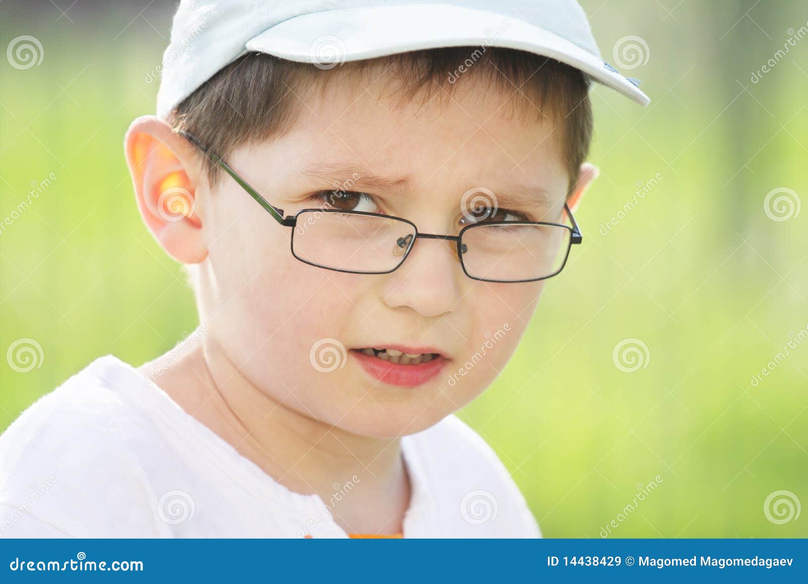 Boy in eyeglasses stock image. Image of green, child - 14438429