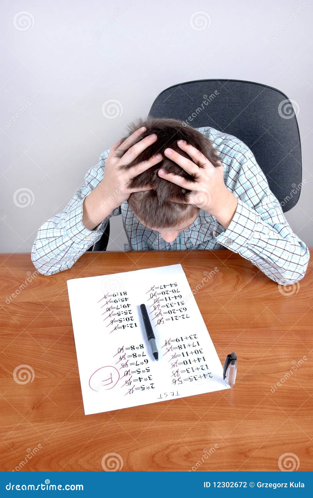 Boy with F grade stock photo. Image of study, young, student - 12302672