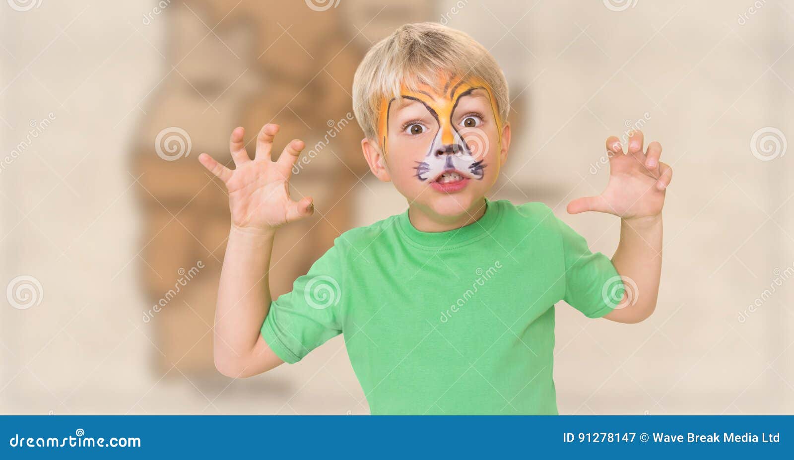 Boy with Facepaint Growling Against Blurry Brown Map Stock Image ...