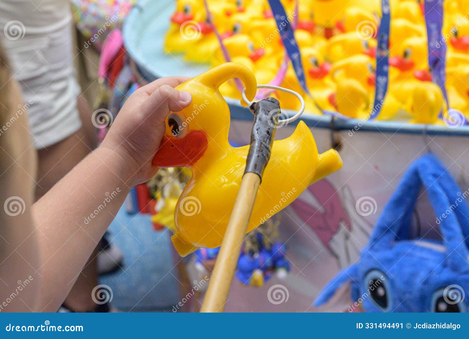 Boy at a Fair Fishing for Rubber Ducks Stock Image - Image of amusement ...