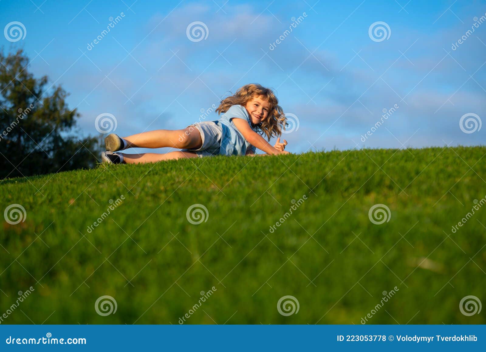 Boy Falling Down on Grass. Kid Falling Off at the Park. Stock Photo ...
