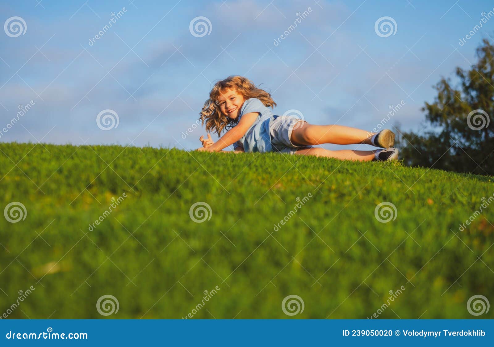 Boy Falling Down on Grass. Kid Falling Off at the Park. Stock Photo ...