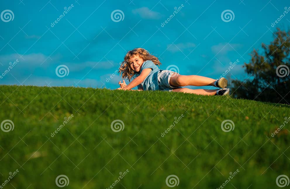Boy Falling Down on Grass. Kid Falling Off at the Park. Stock Image ...