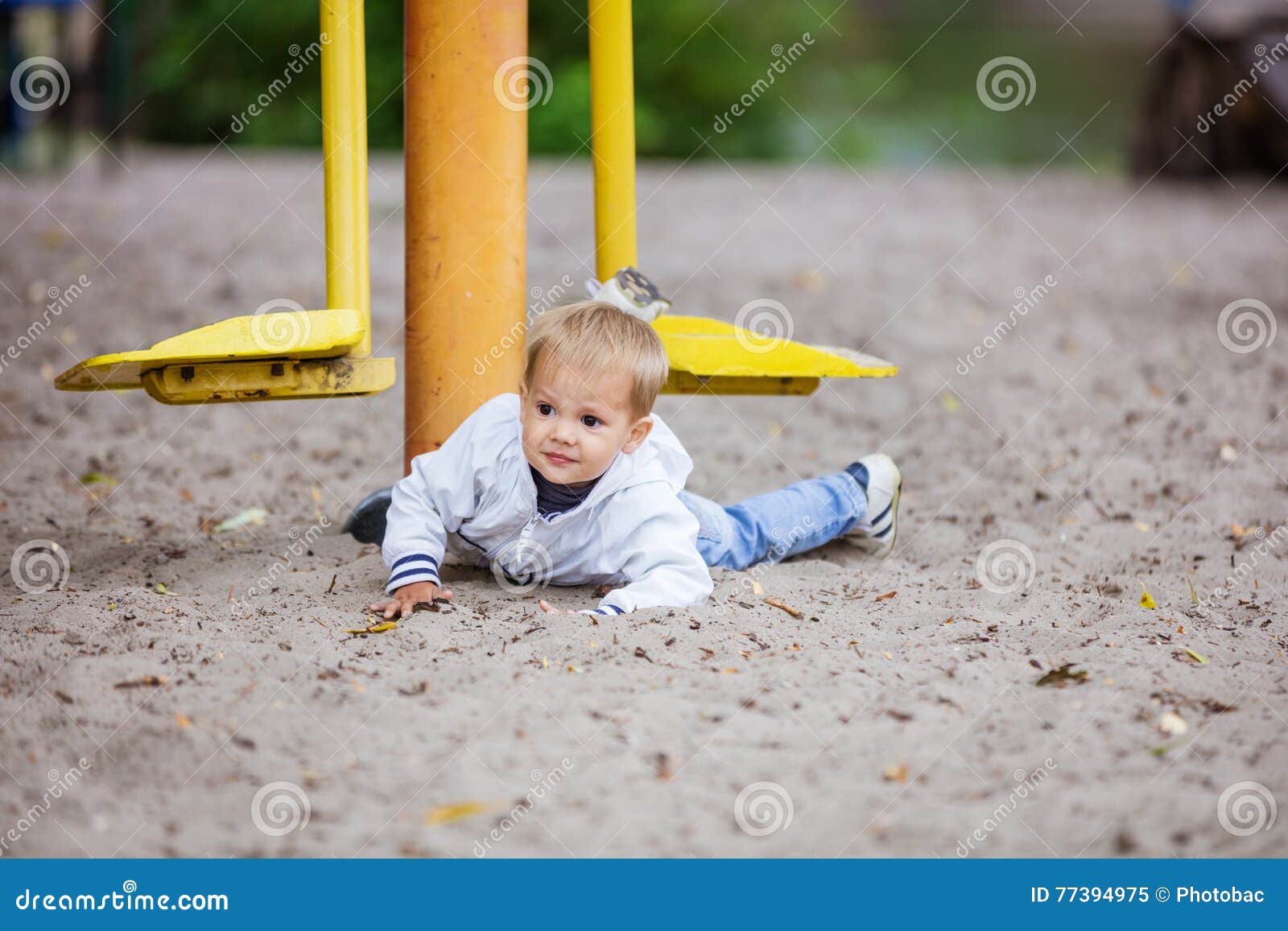 Boy Falling from Outdoor Exercise Machine Stock Image - Image of ...