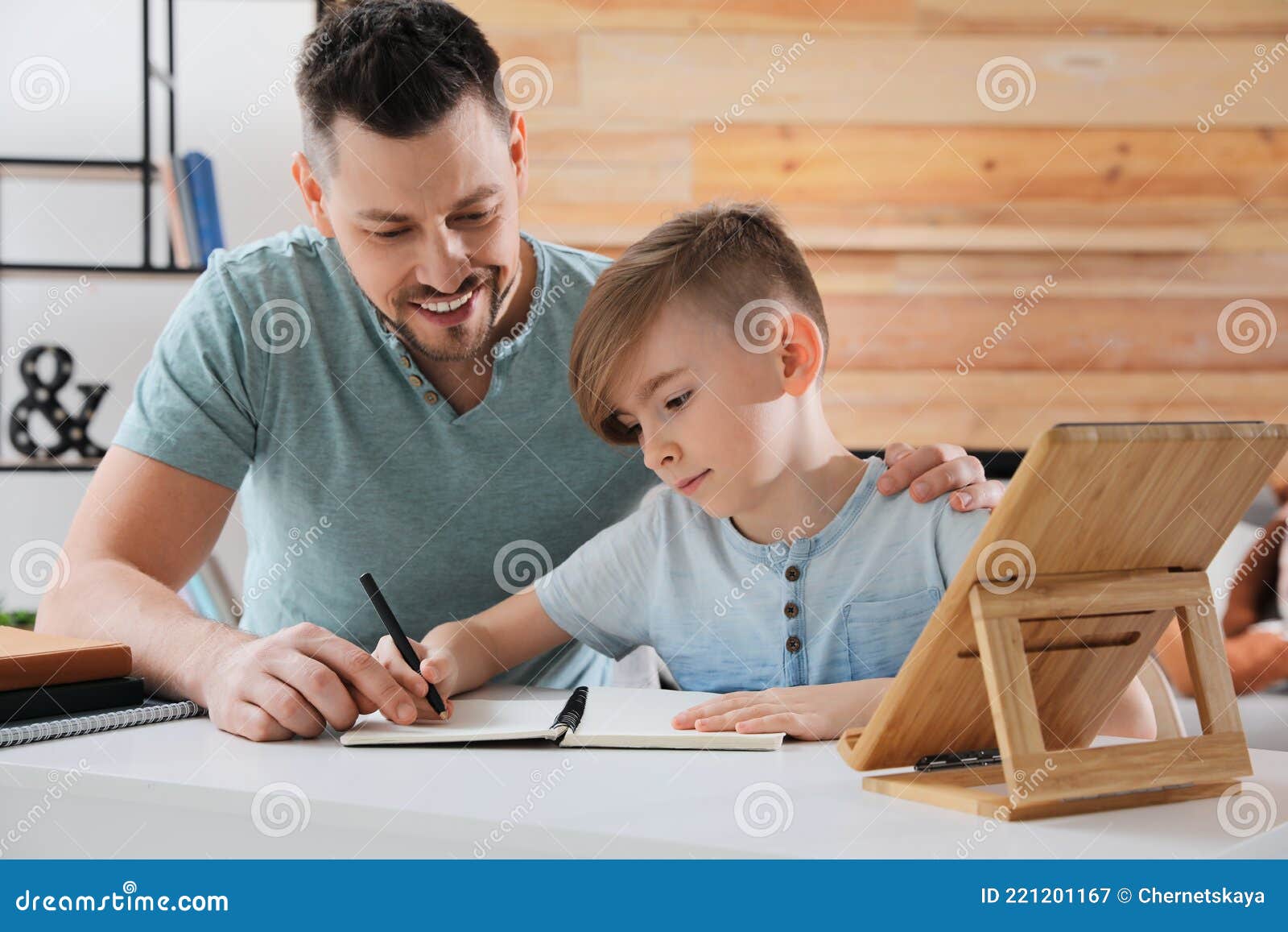 Boy with Father Doing Homework at Table Stock Image - Image of family ...