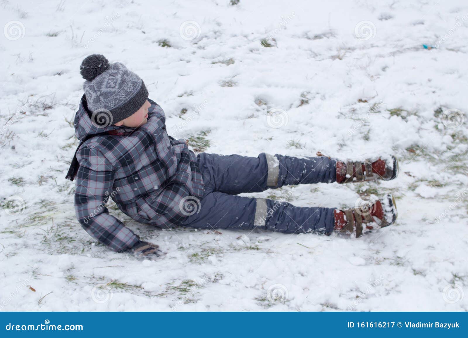 Boy Fell on Snow,boy Slipped on the Ice and Fell into the Snow Stock ...