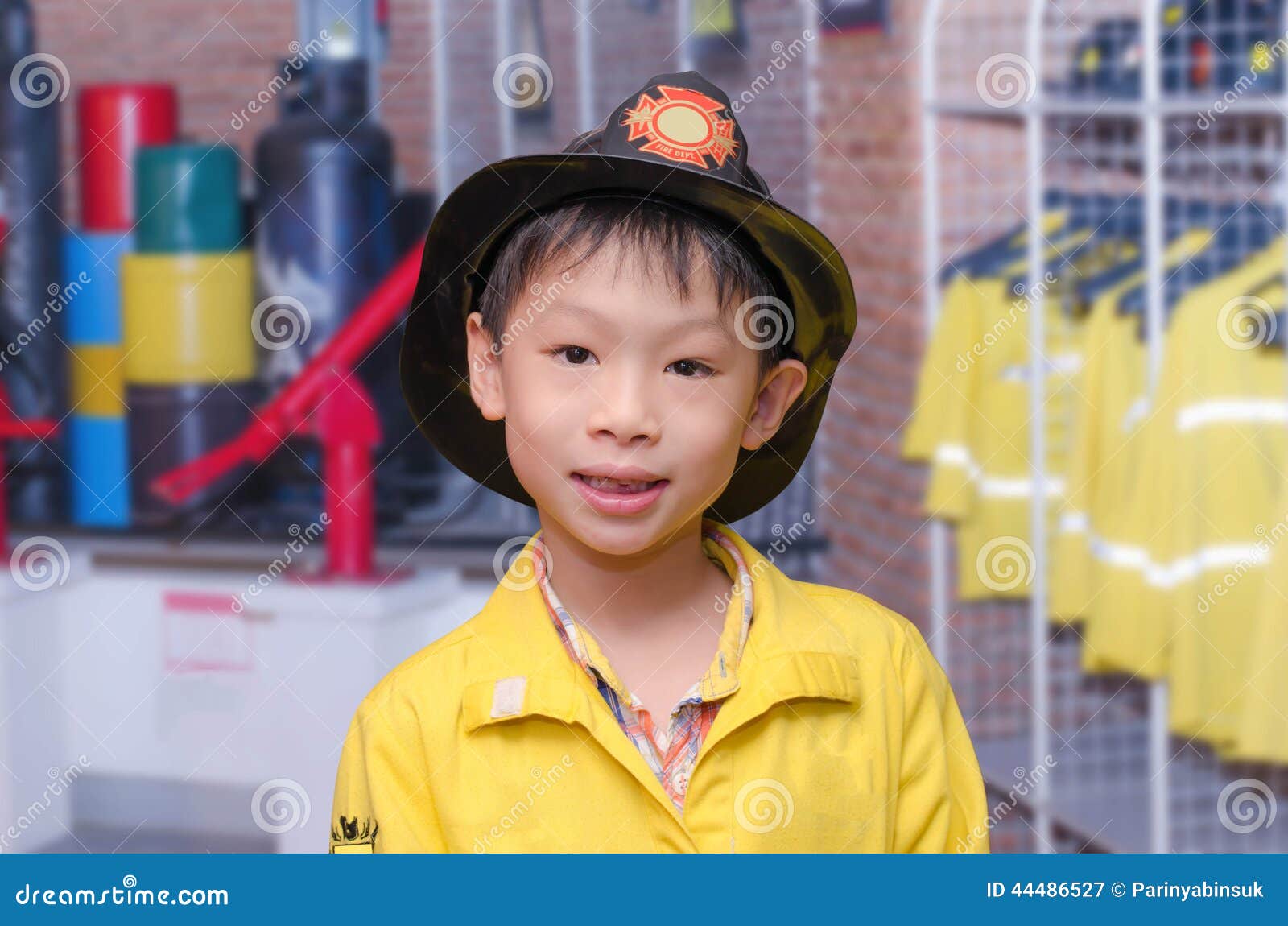 Boy in firefighter uniform stock image. Image of portrait - 44486527
