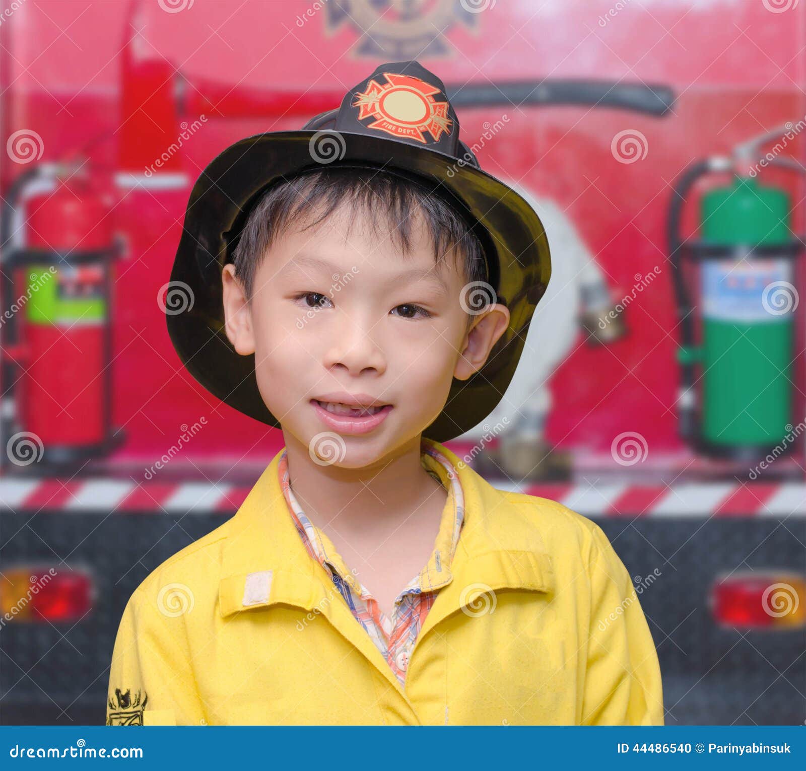 Boy in firefighter uniform stock photo. Image of childhood - 44486540