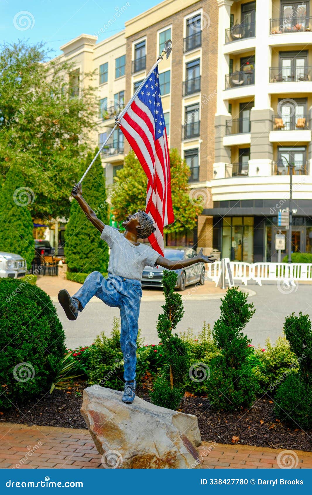 Boy with Flag Statue Avalon Mixed Use Development in Alpharetta ...