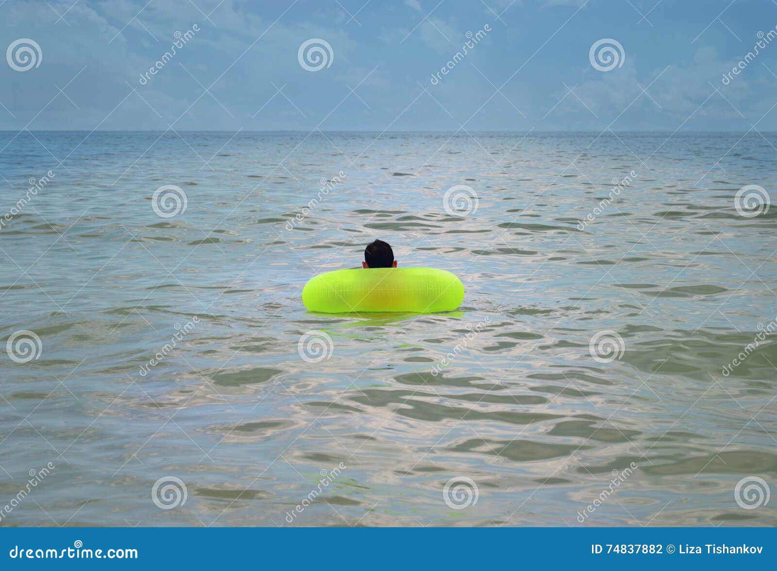 Boy Floating in Waves at Seashore Stock Photo - Image of riding ...