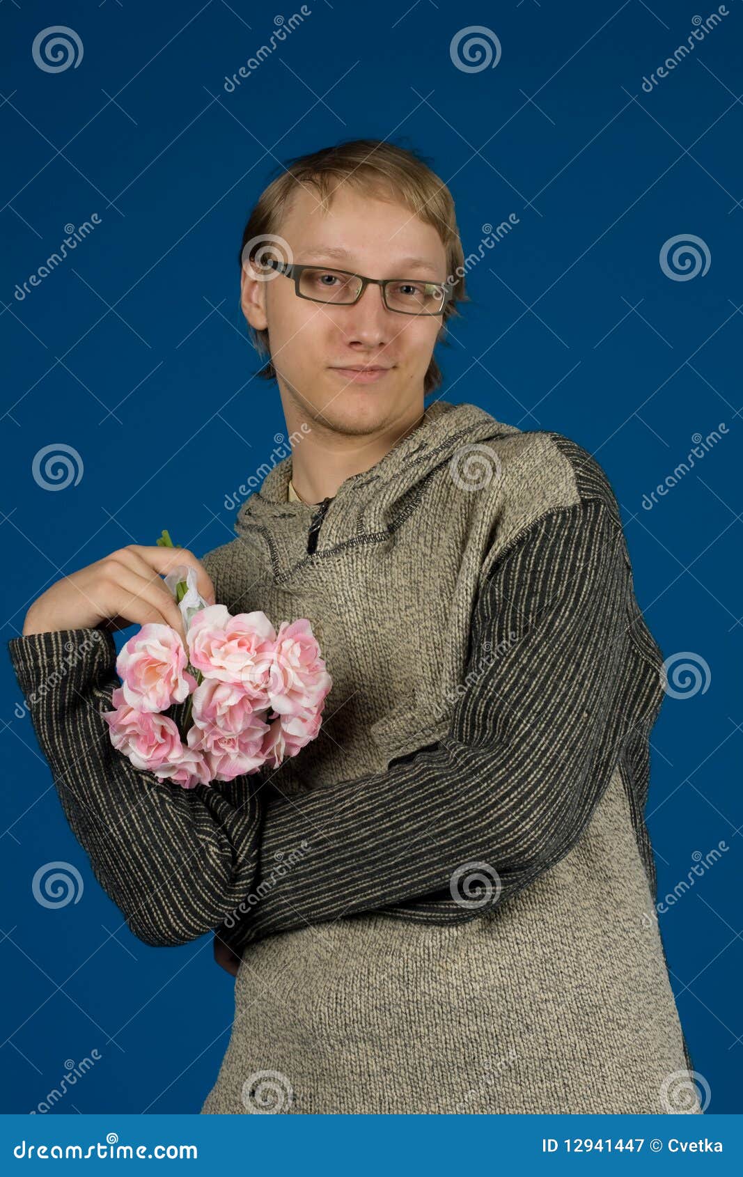 Boy with flowers stock image. Image of expressive, nature - 12941447