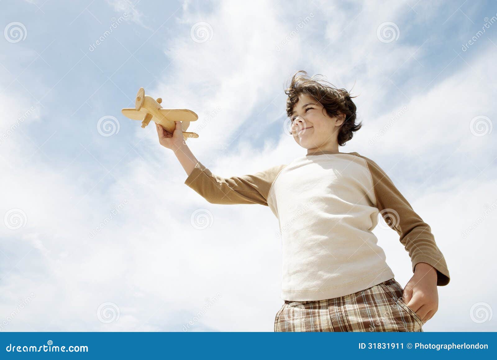 Boy Flying Toy Airplane Against Cloudy Sky Stock Image - Image of ...