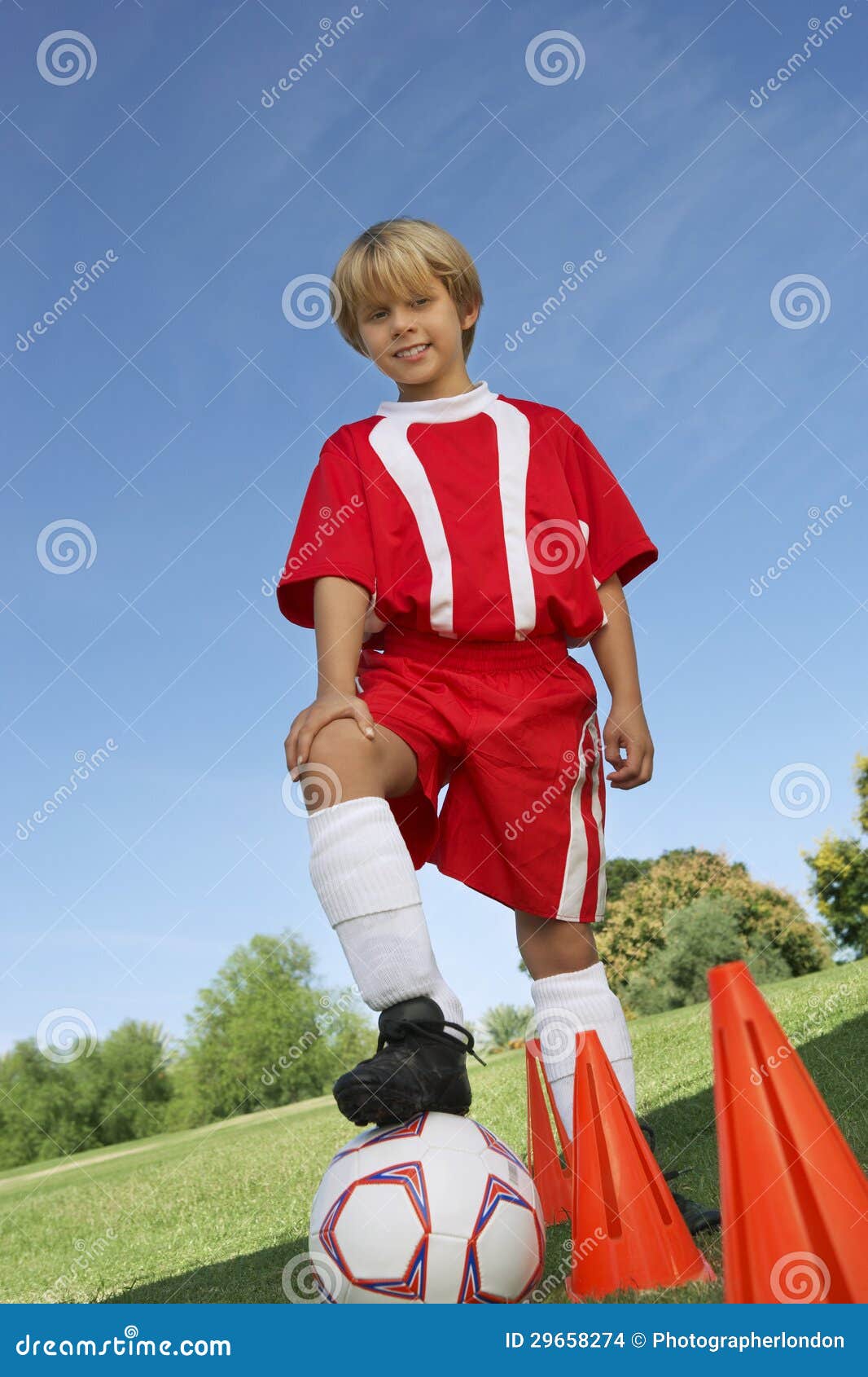 Boy with Foot on Soccer Ball Stock Photo - Image of equipment ...