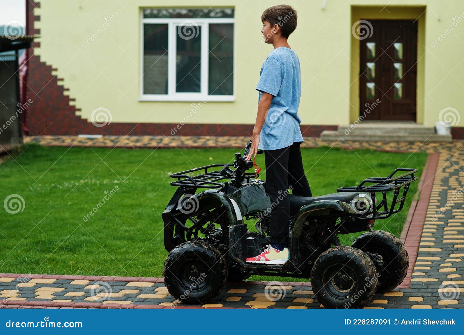 Boy in Four-wheller ATV Quad Bike Stock Image - Image of quadbike ...