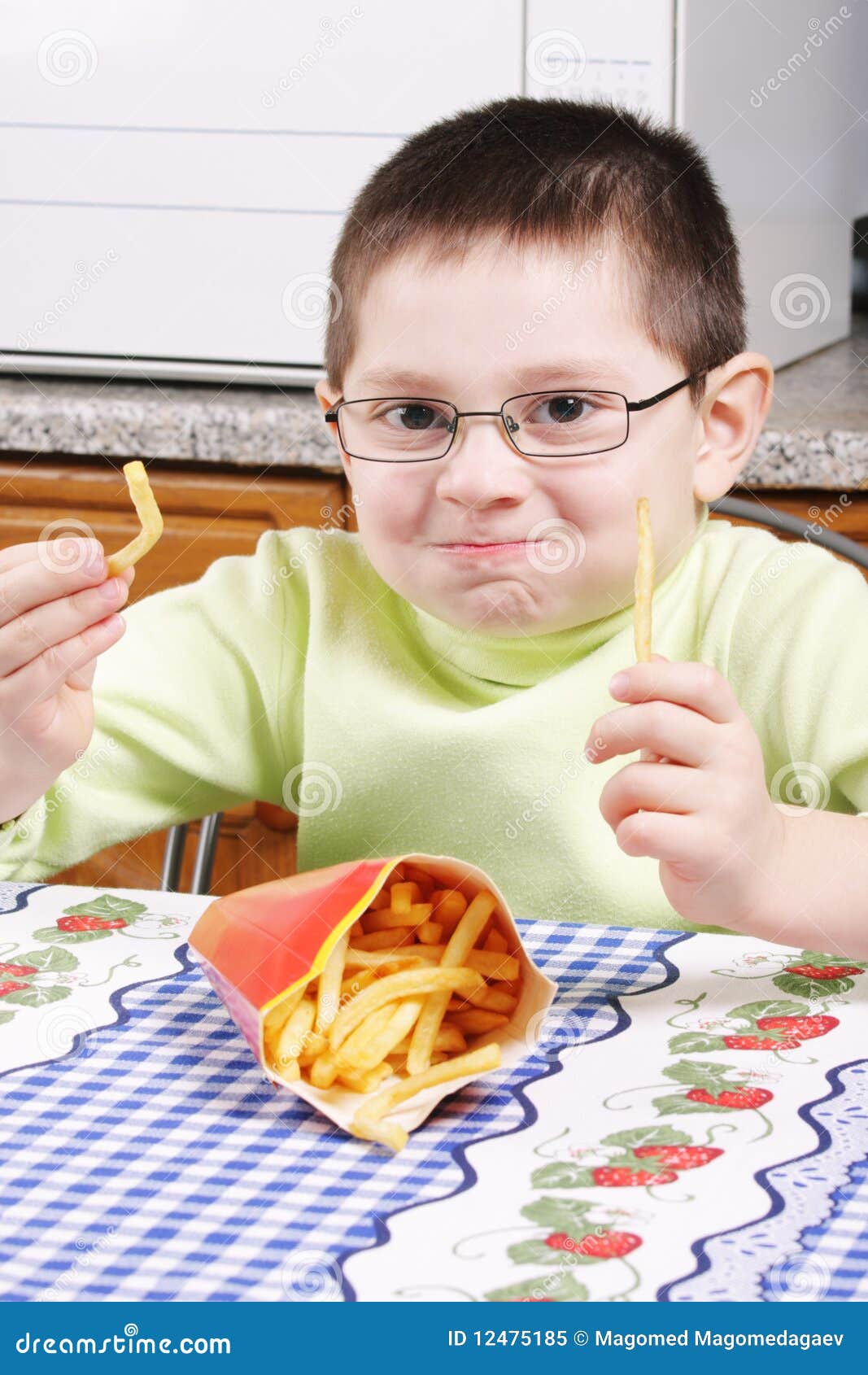 Boy with french fries stock image. Image of fries, junk - 12475185
