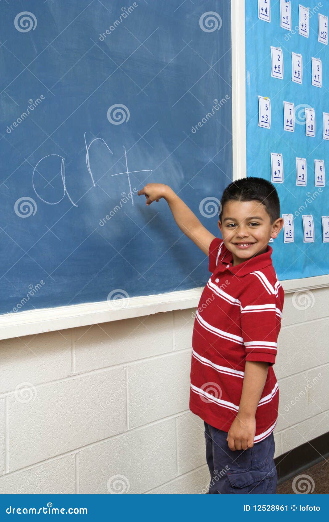 Boy in front of Blackboard stock image. Image of proud - 12528961