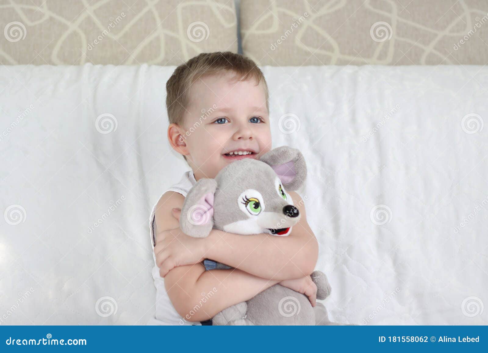 A Boy with a Funny Expression on His Face. with a Toy. Emotions ...