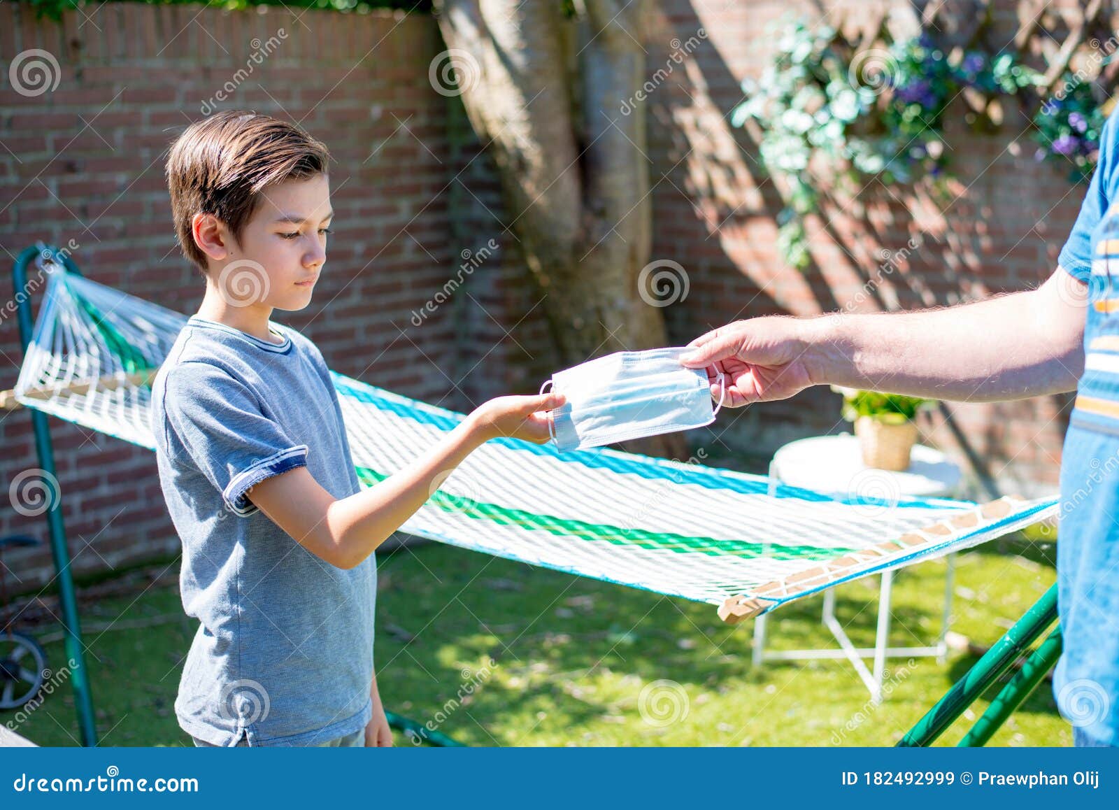 The Boy Get Medical Mask from Father Stock Image - Image of mask ...