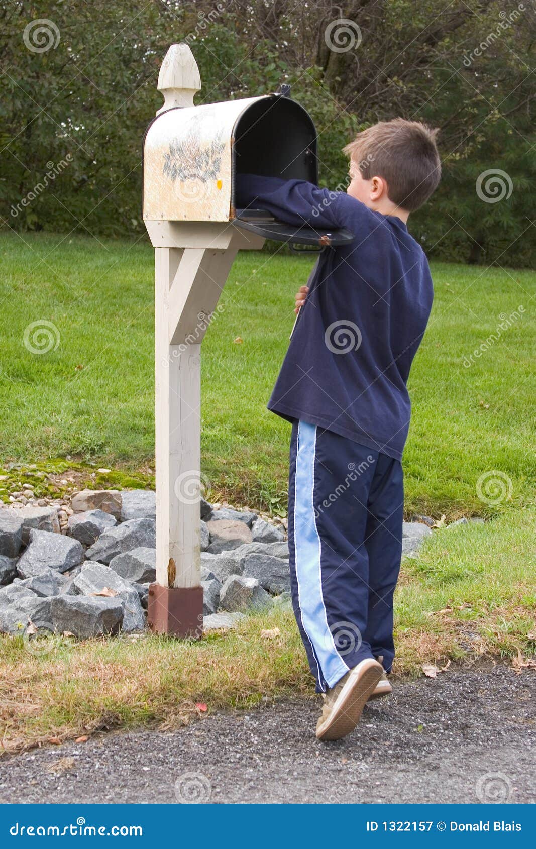 Boy getting mail stock image. Image of mailbox, postal - 1322157