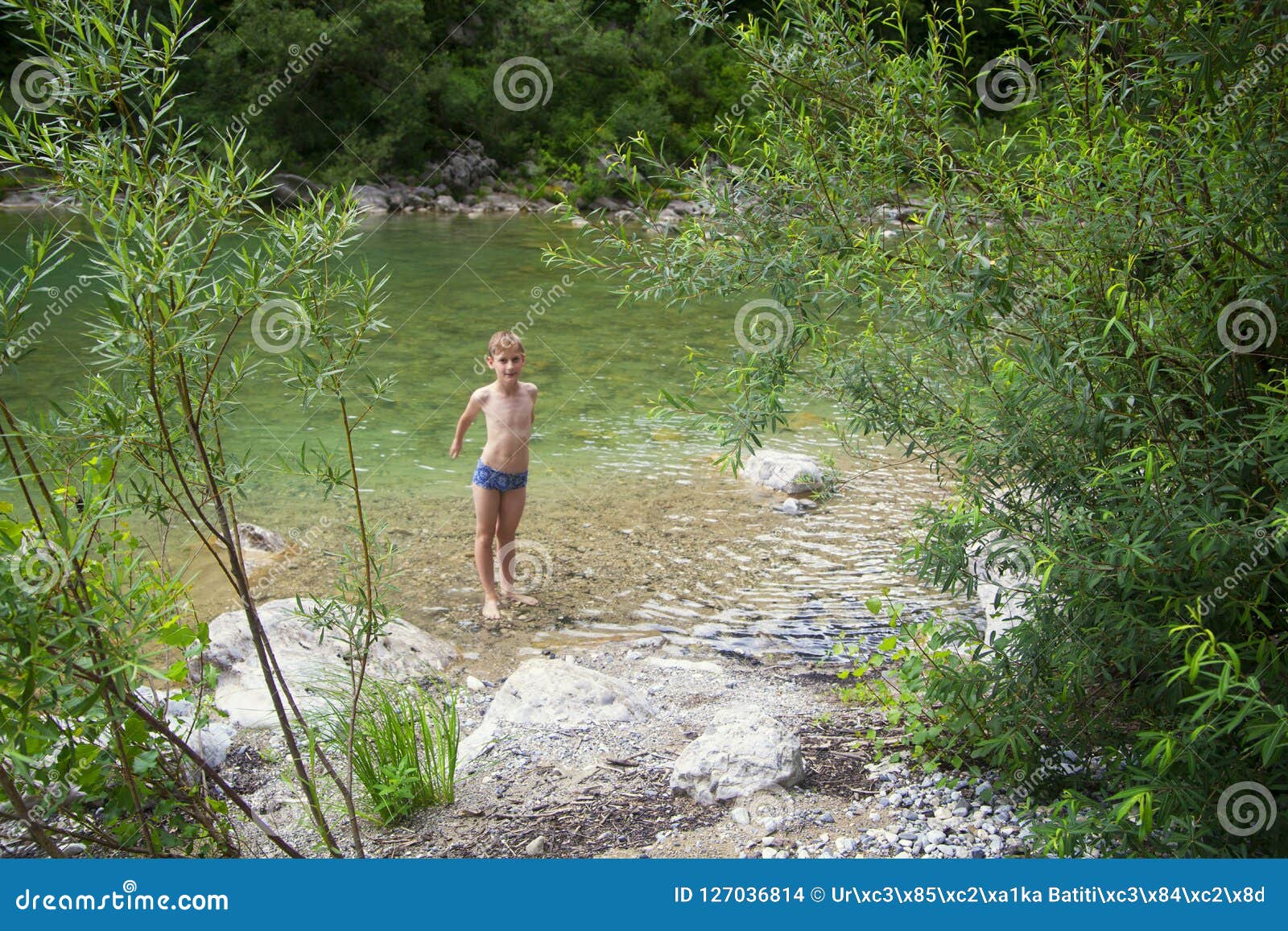 Boy at the river stock photo. Image of childhood, nature - 127036814