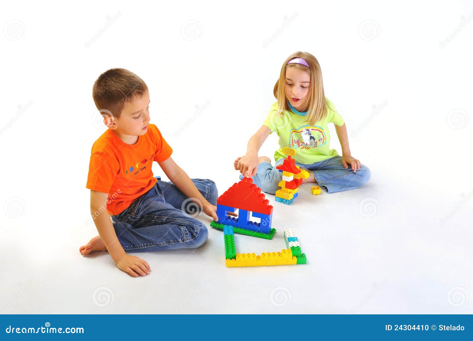 Boy and Girl Building House Stock Photo - Image of build, blocks: 24304410