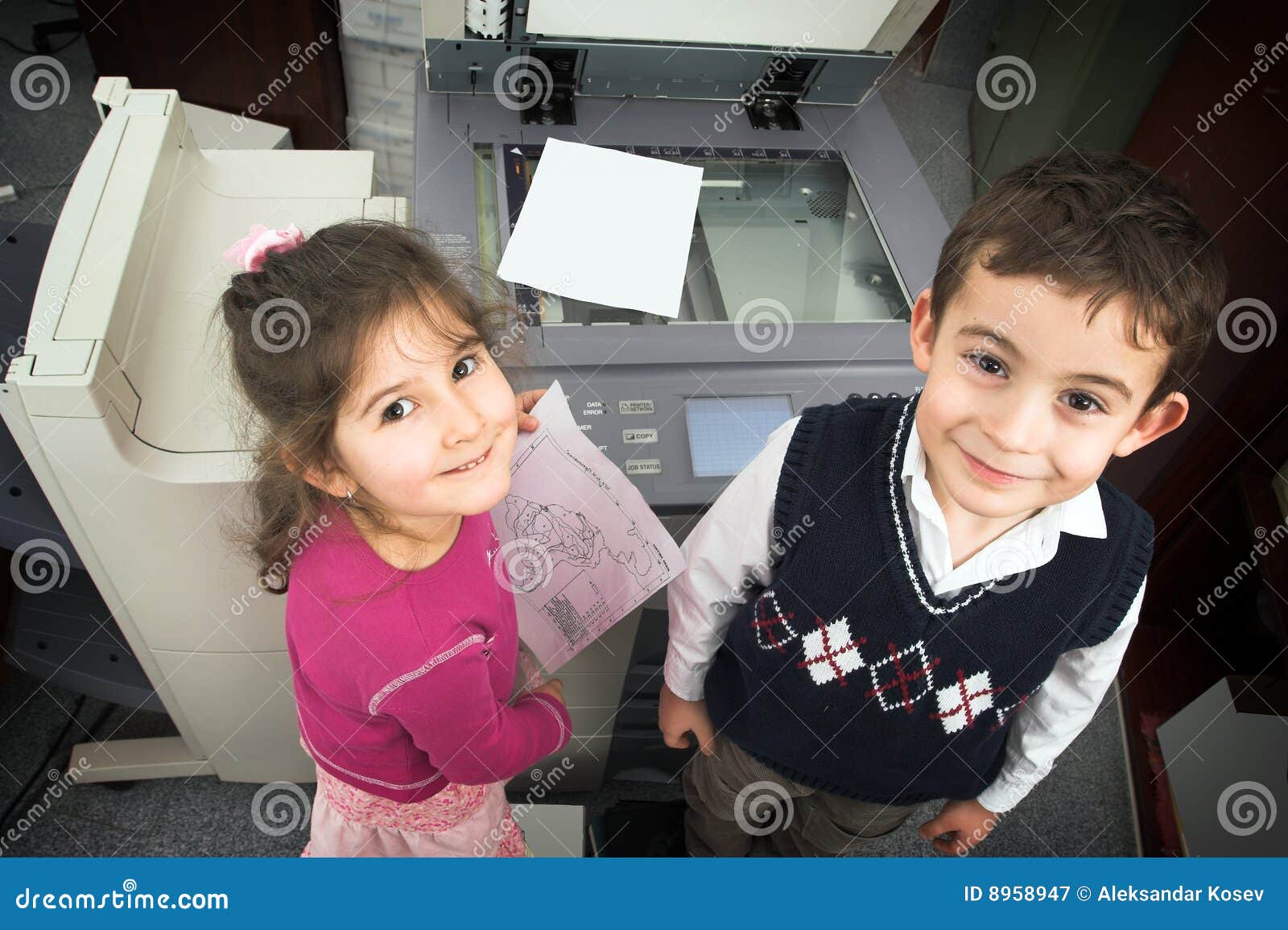 Boy,girl and copier stock image. Image of kids, child - 8958947