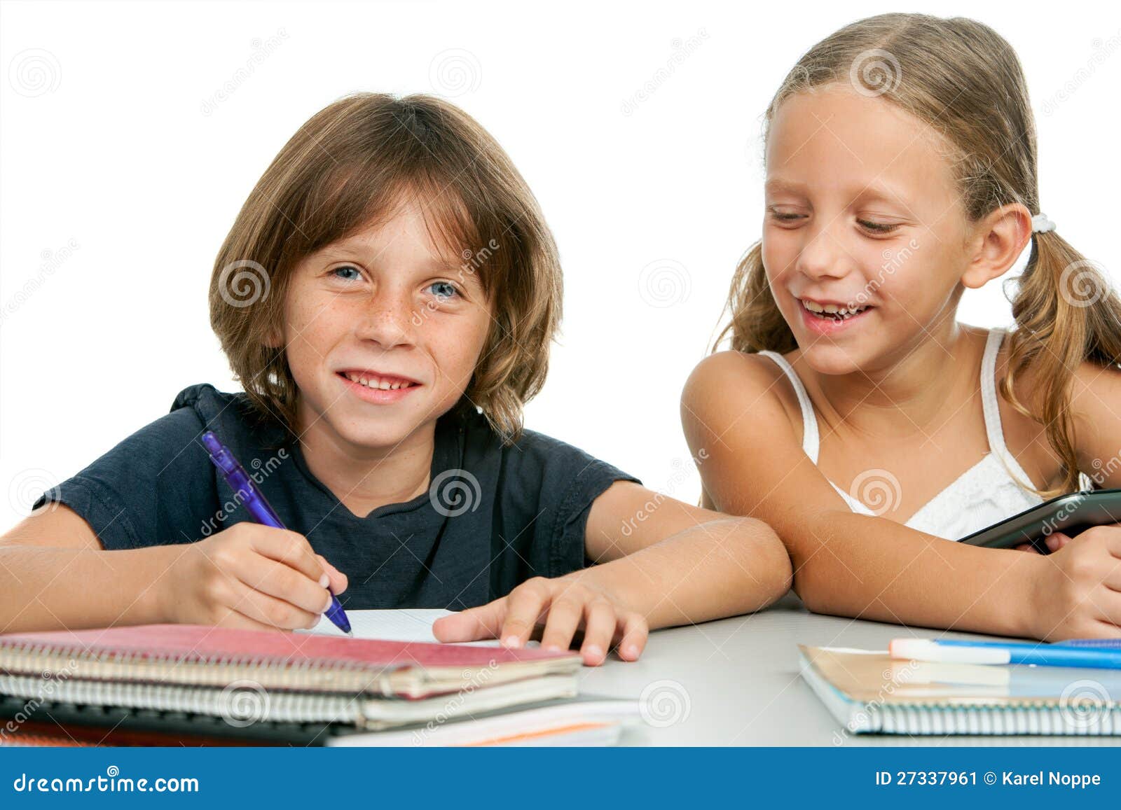 Boy and Girl at Homework Desk. Stock Image - Image of copy, close: 27337961