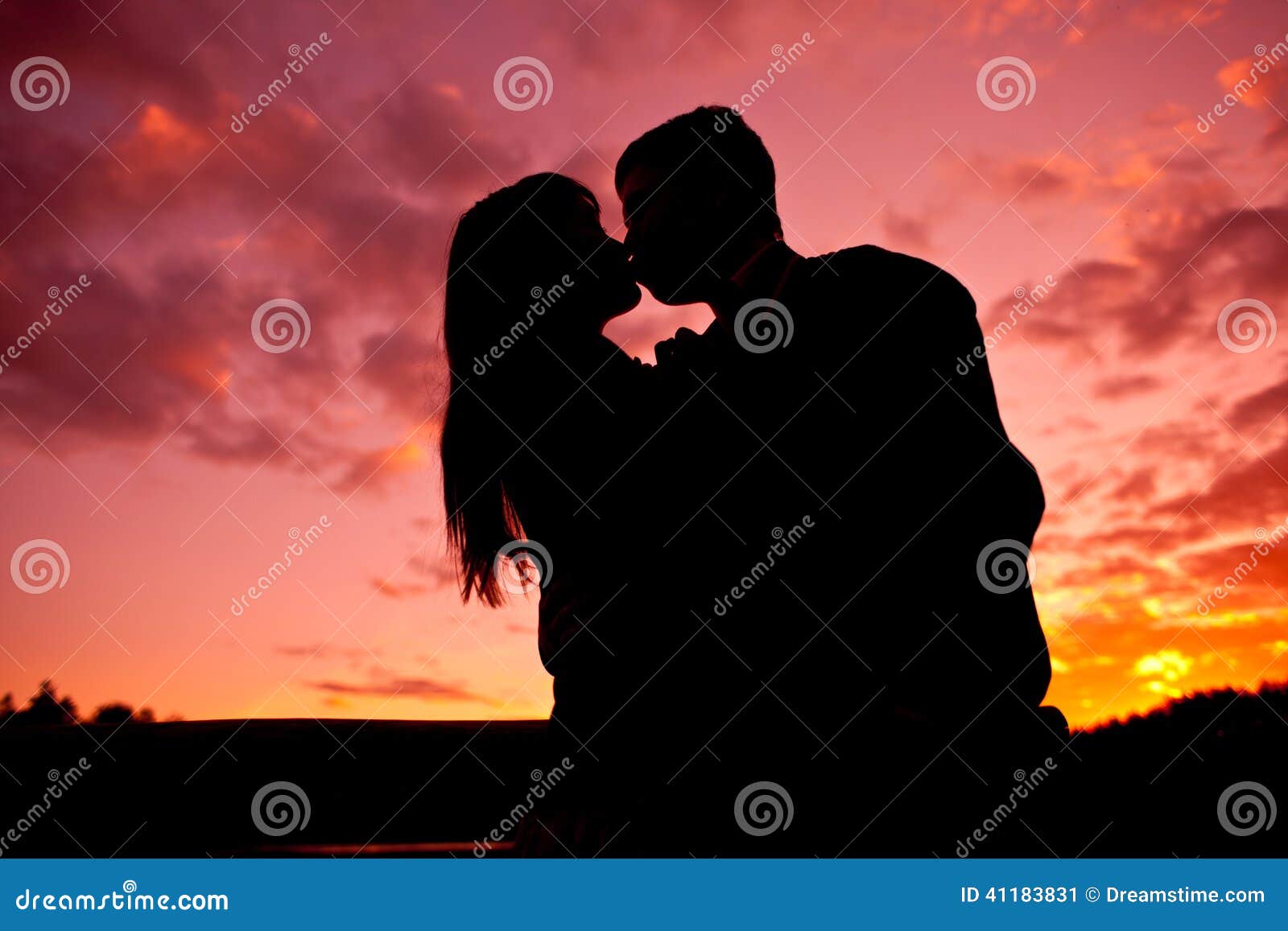 Boy and Girl Kissing at Sunset Stock Image - Image of kissing, beauty ...