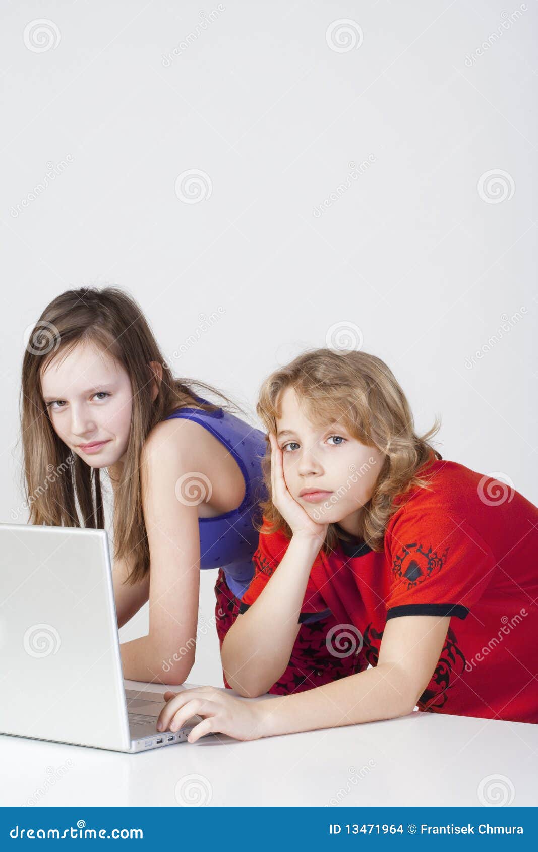 Boy and girl with laptop stock photo. Image of preadolescent - 13471964
