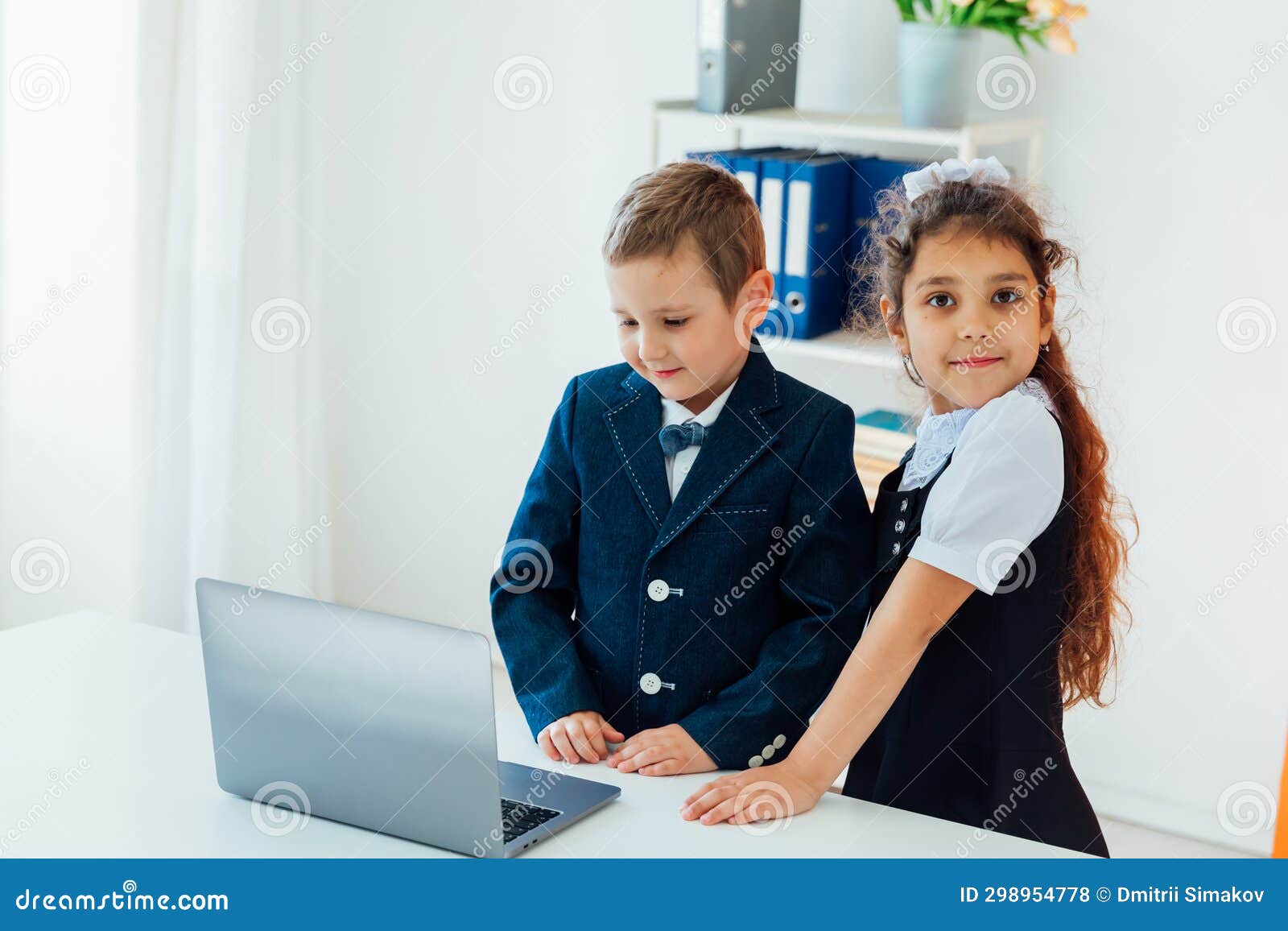 Boy and Girl Learning Watching Laptop Stock Photo - Image of schooling ...