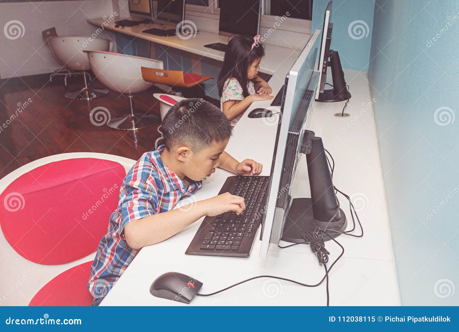 Boy and Girl Playing with a Computer Stock Image - Image of girl ...