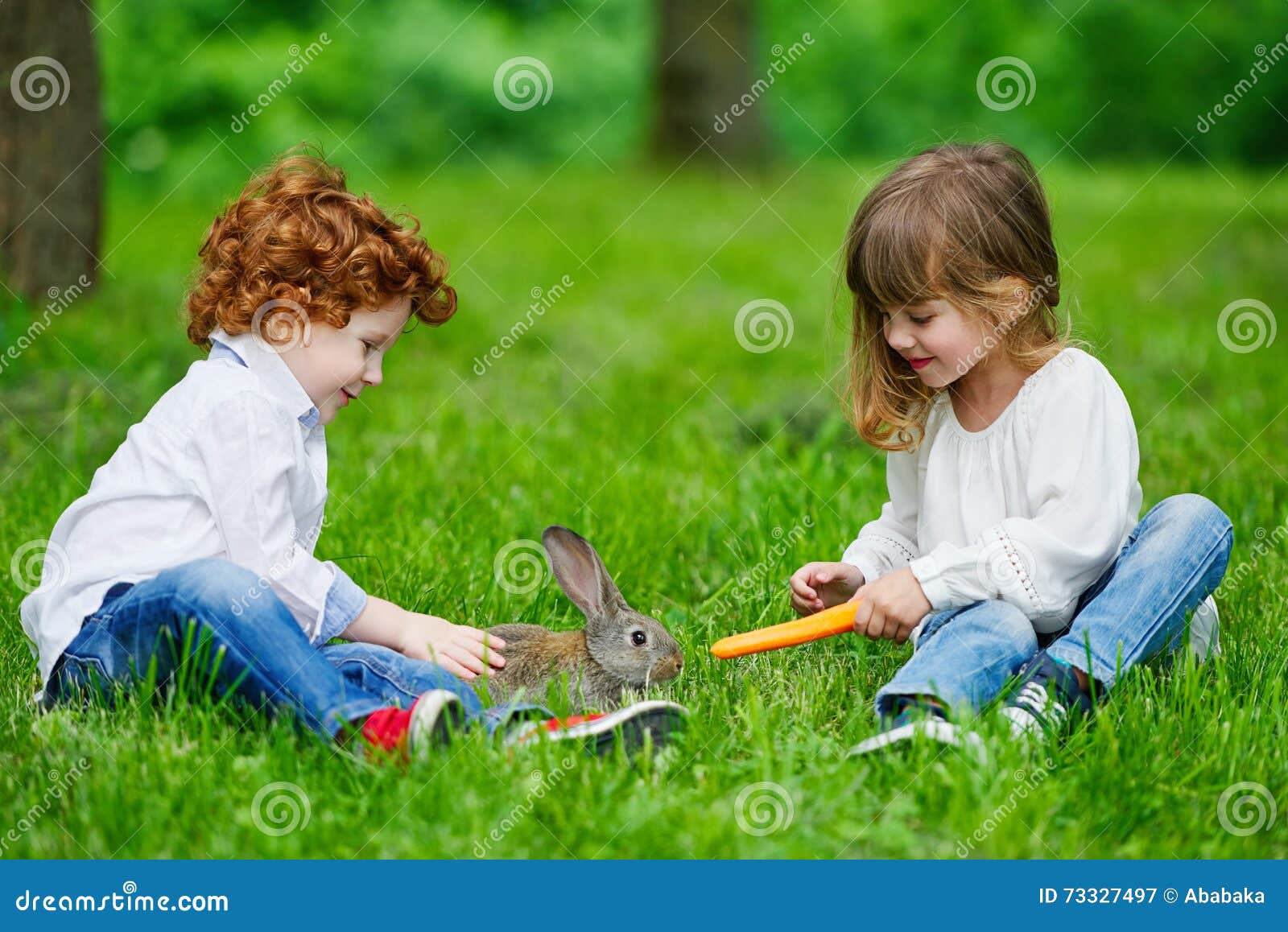 Boy and Girl Playing with Rabbit Stock Image - Image of care, childhood ...
