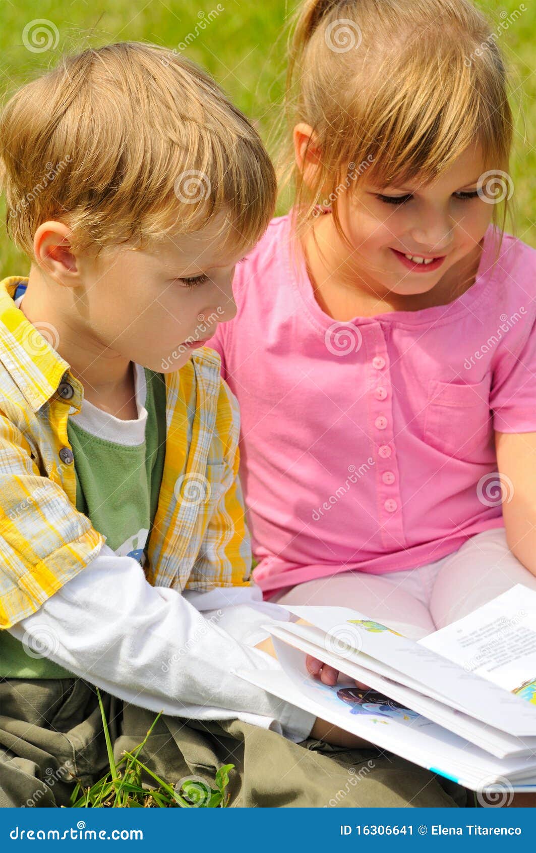 Boy and Girl are Reading a Book Stock Image - Image of cheerful ...