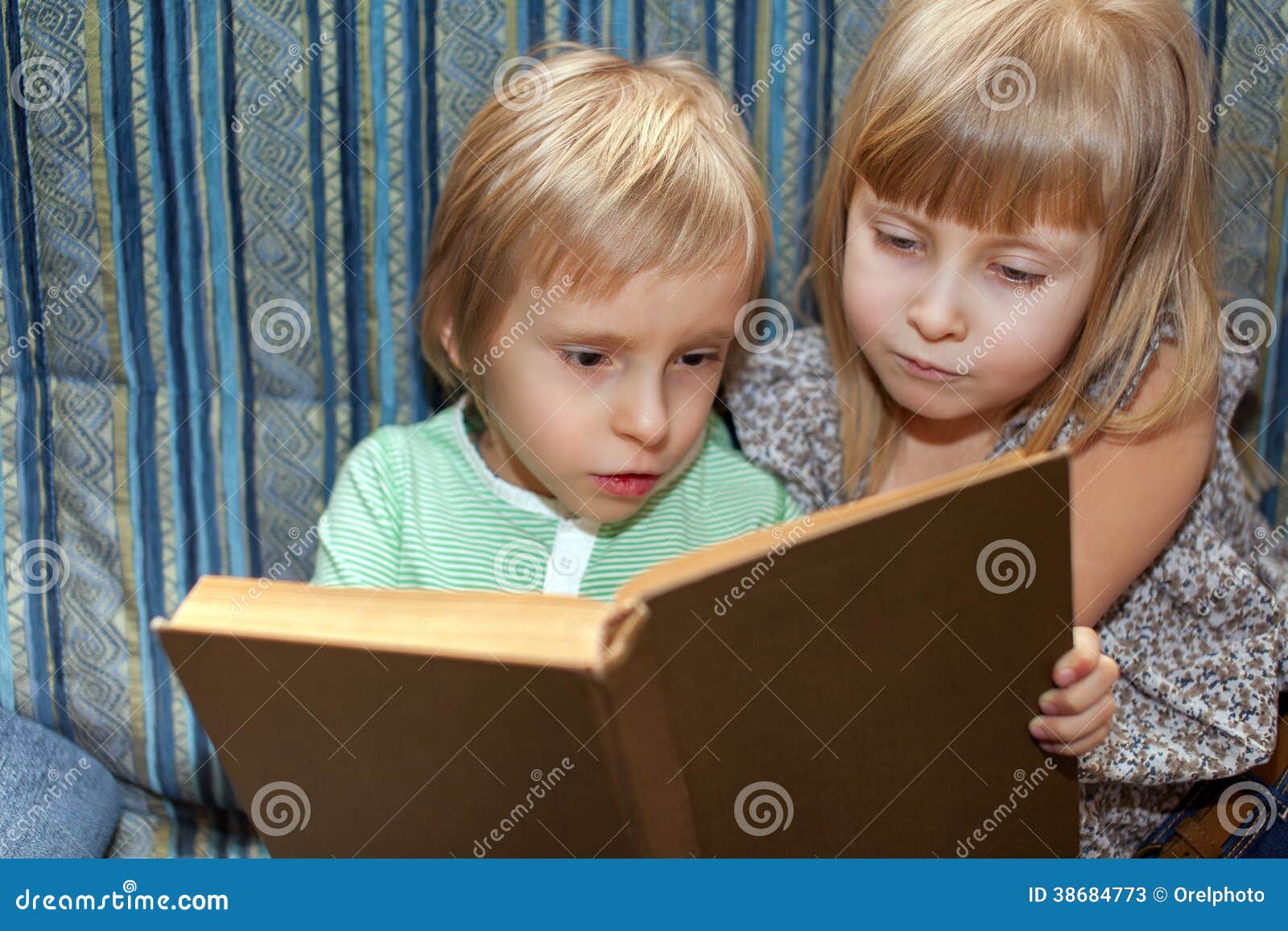 Boy and Girl are Reading Book Stock Image - Image of indoors, caucasian ...