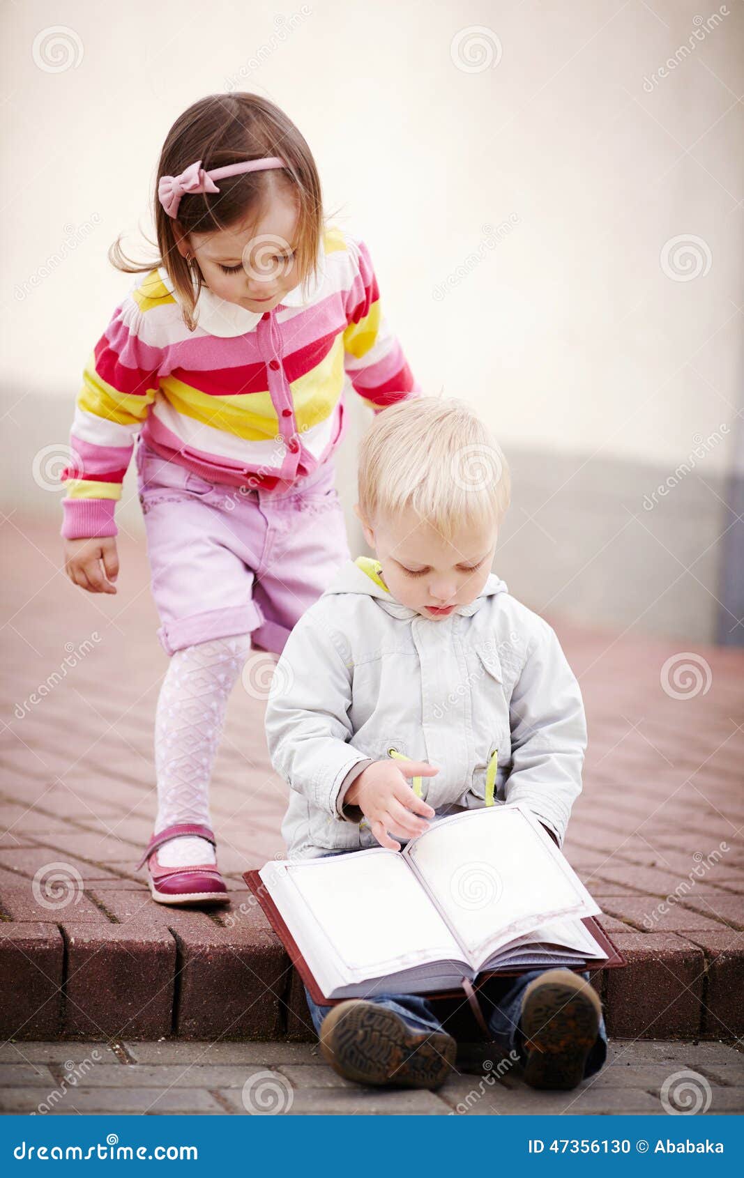 Boy and Girl Reading a Book Stock Photo - Image of park, love: 47356130