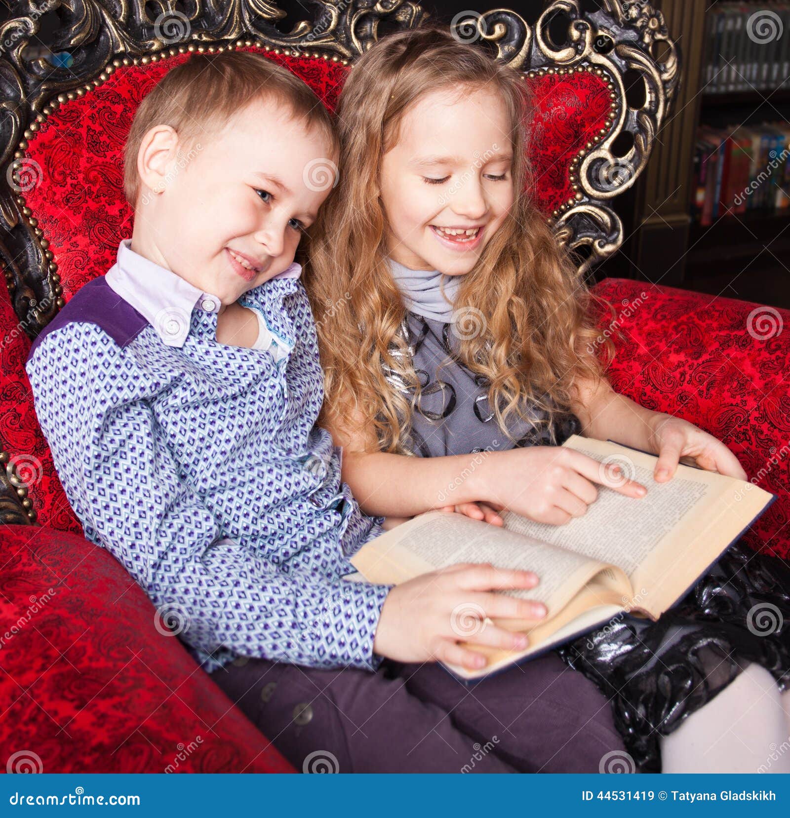 Boy and Girl Reading Book at Home Stock Image - Image of indoors, multi ...