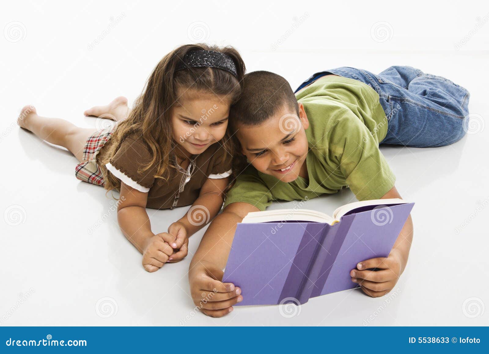 Boy and Girl Reading Book Together. Stock Image - Image of happy ...
