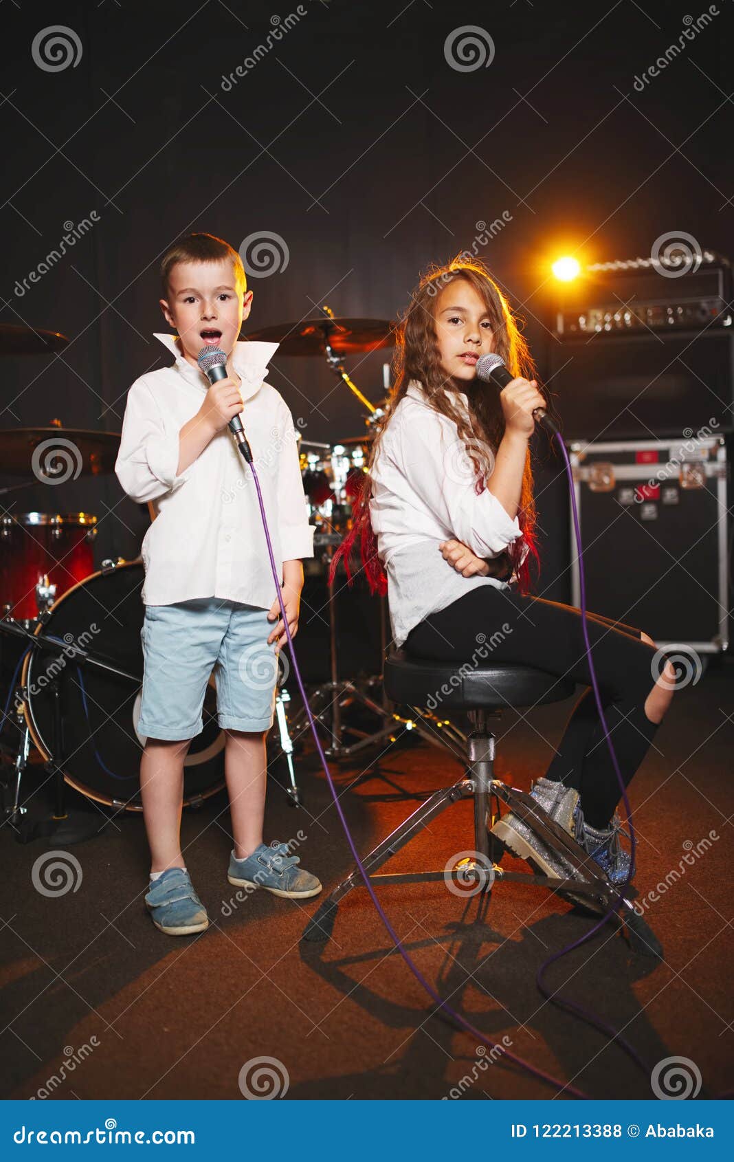Boy and Girl Singing in Recording Studio Stock Photo - Image of concert ...