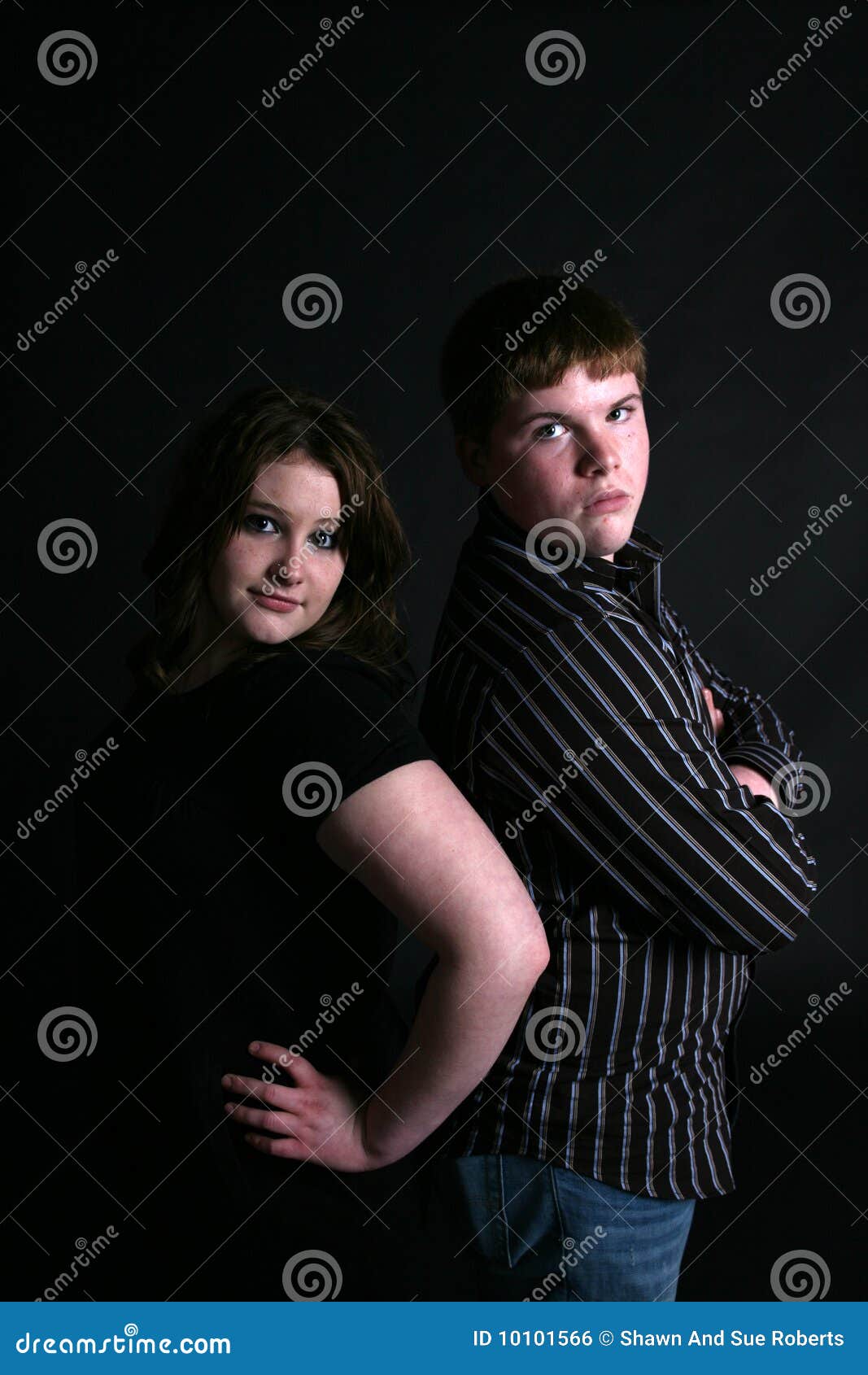 Boy and Girl Standing Back To with Attitude Stock Photo - Image of ...