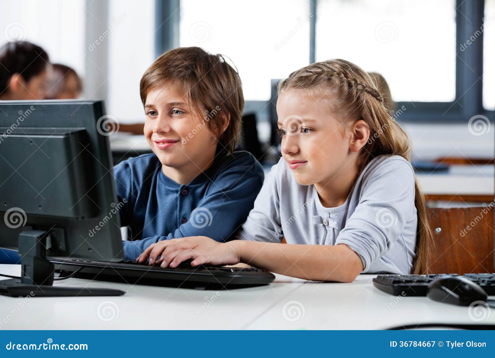 Boy and Girl Using Desktop Pc in School Computer Stock Image - Image of ...