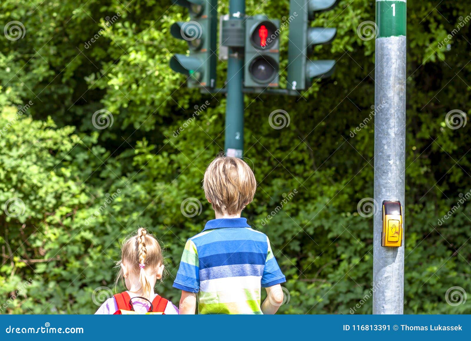 Boy and Girl Waiting at the Red Traffic Light Stock Image - Image of ...