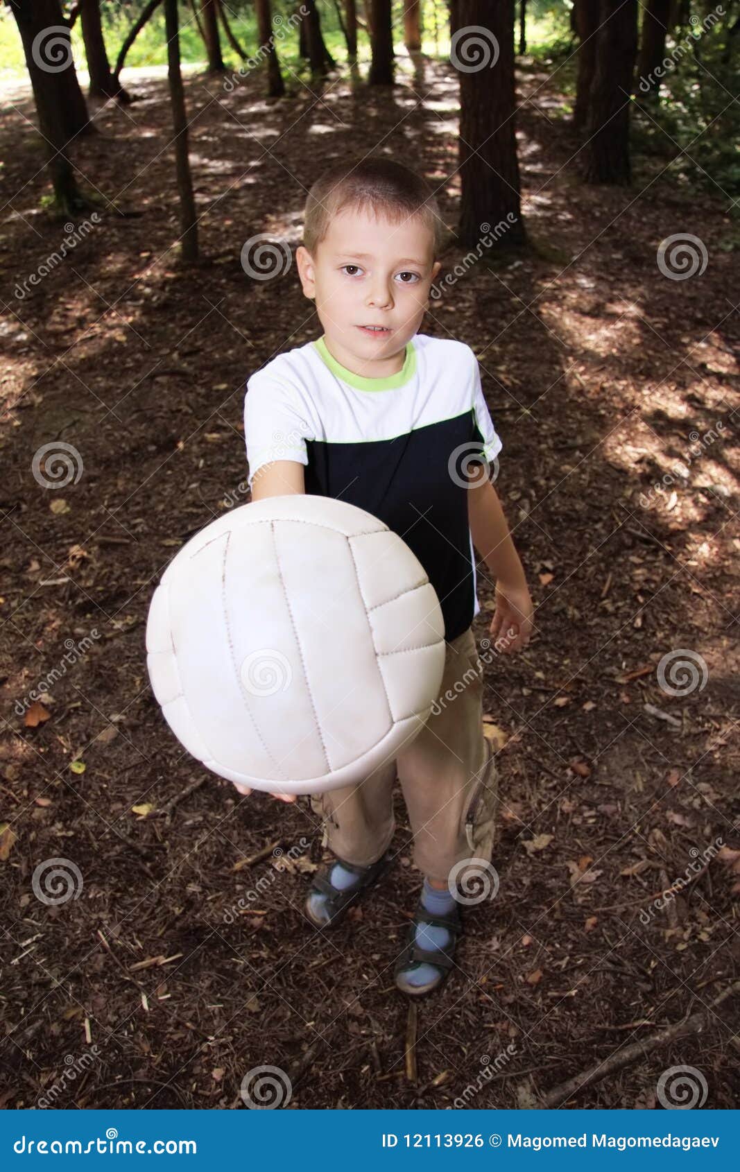 Boy giving ball stock photo. Image of dark, summer, person - 12113926