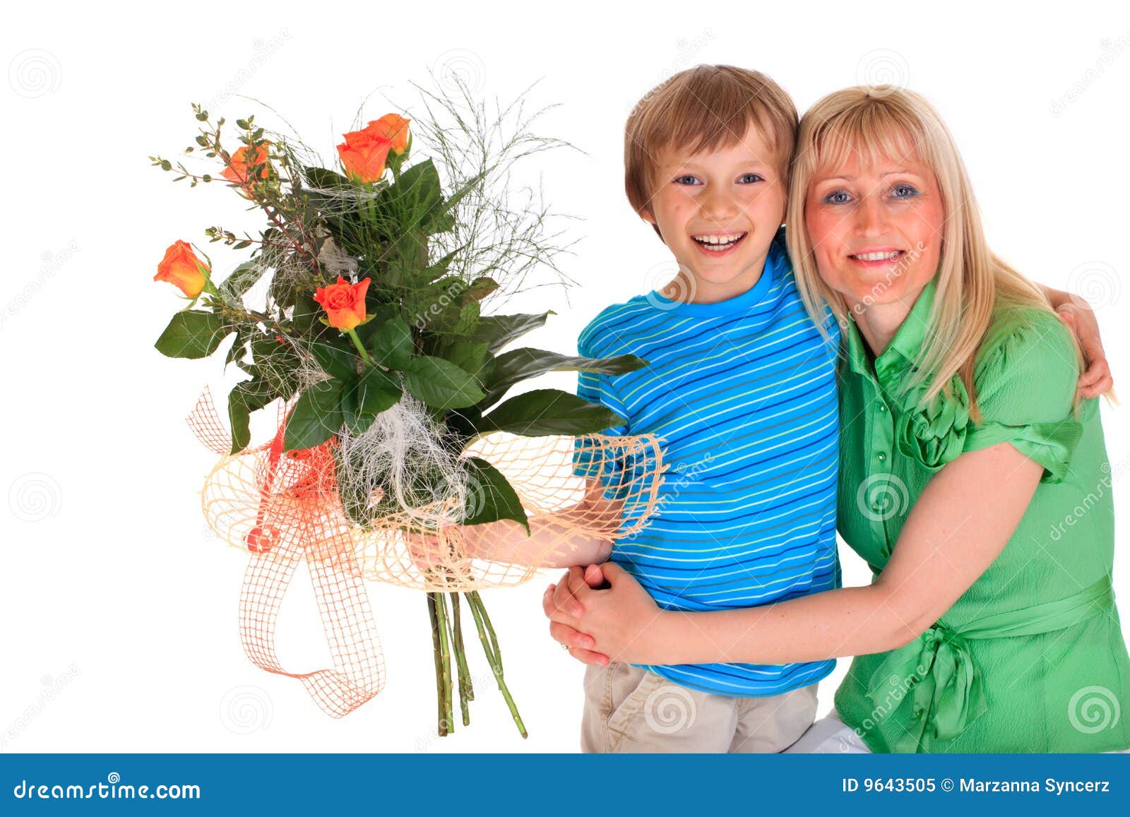 Boy giving mother flowers stock image. Image of family - 9643505